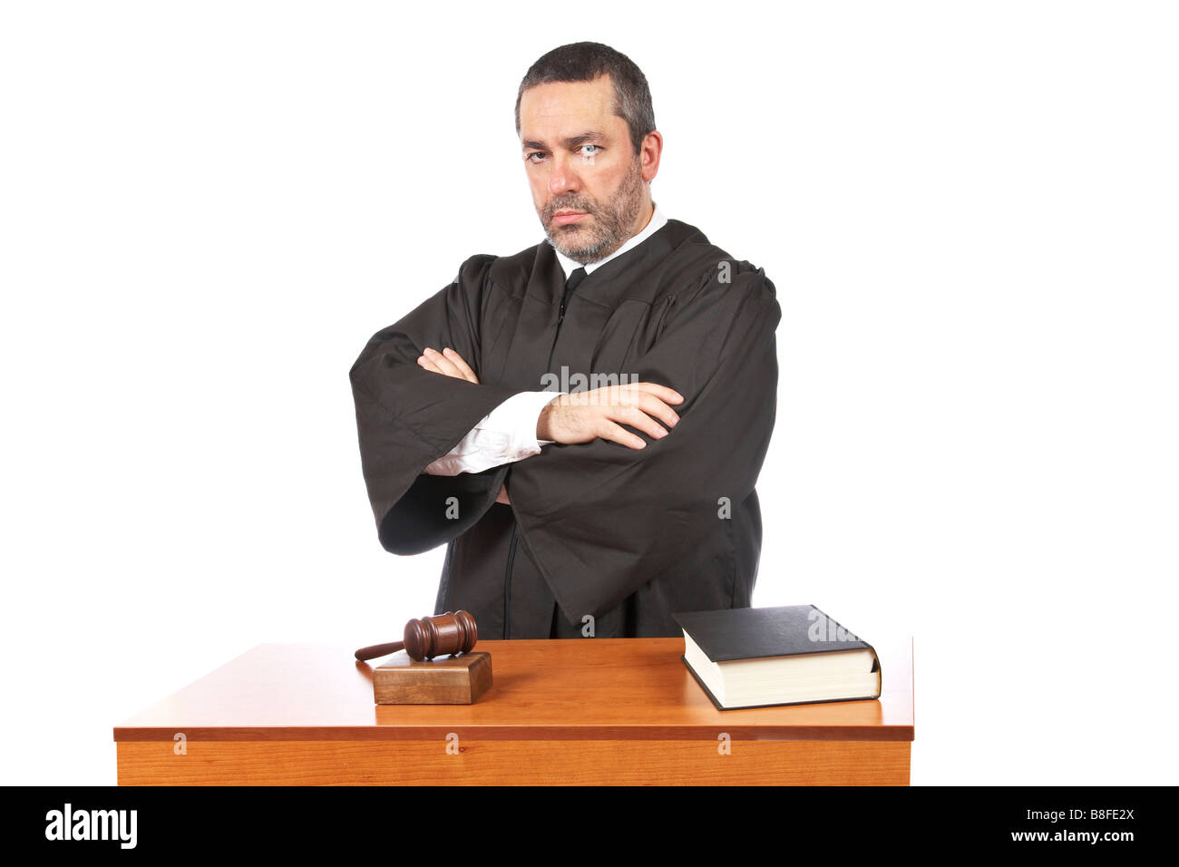 A serious male judge isolated on white background Stock Photo - Alamy