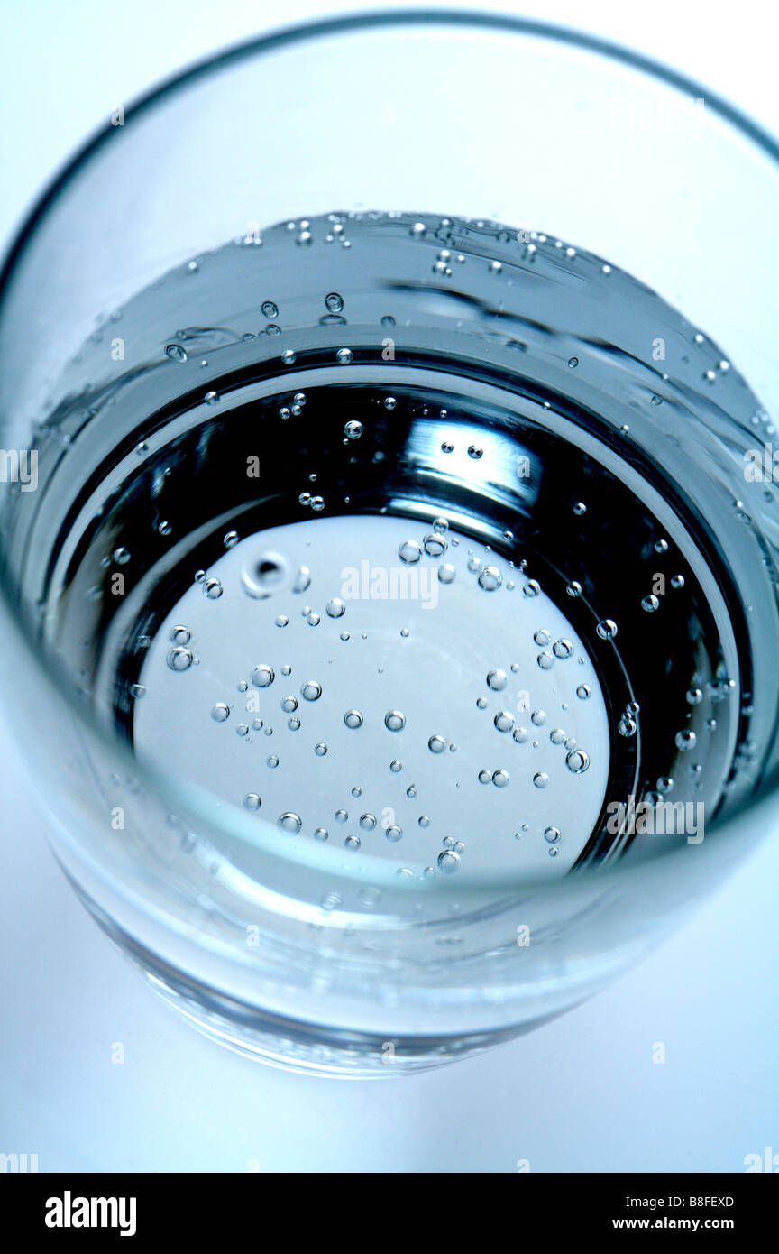 Close up of a glass of water with air bubbles Stock Photo - Alamy