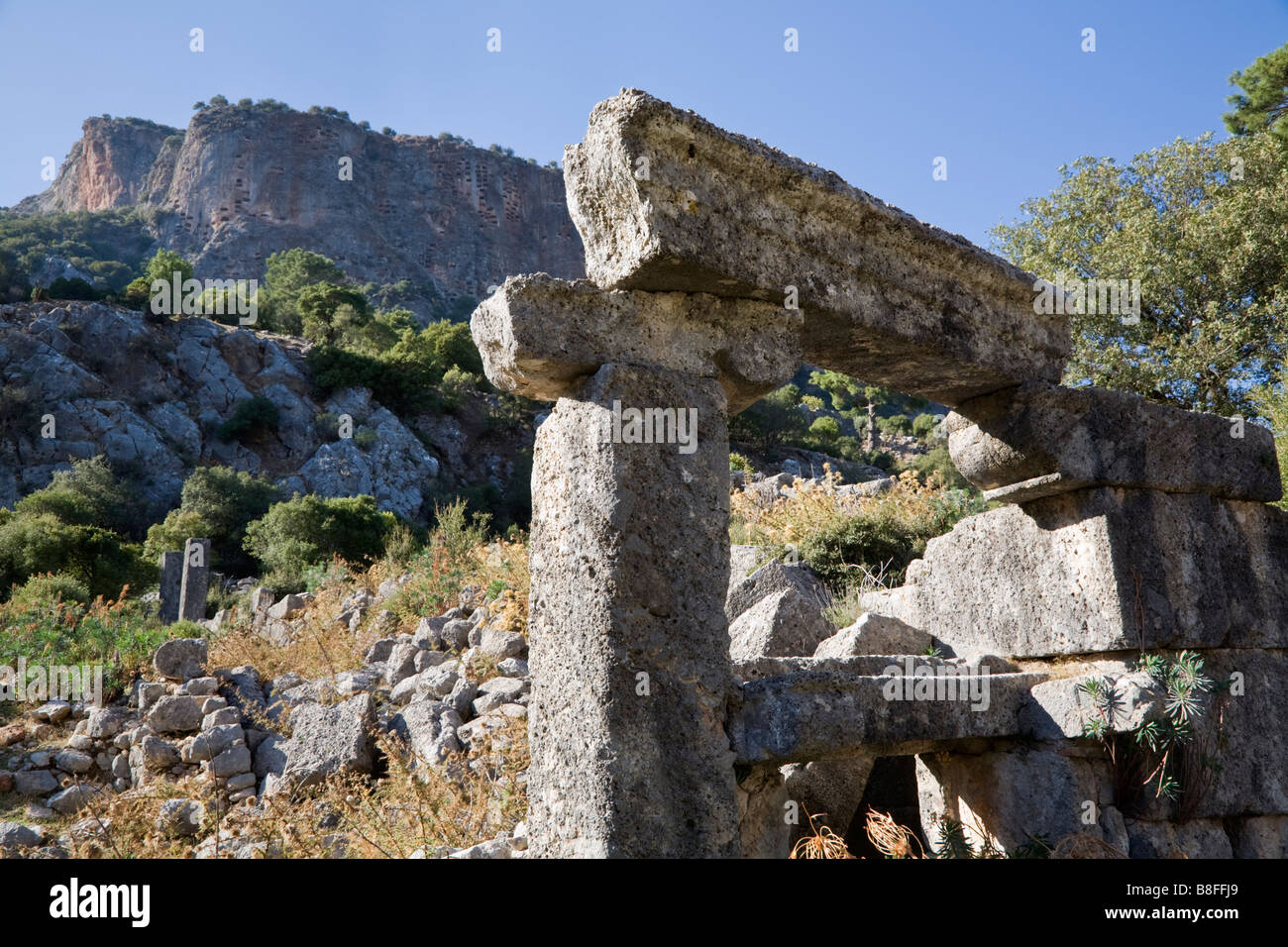 ancient stone lintel amongst the rock tombs at Pinara in Turkey Stock ...