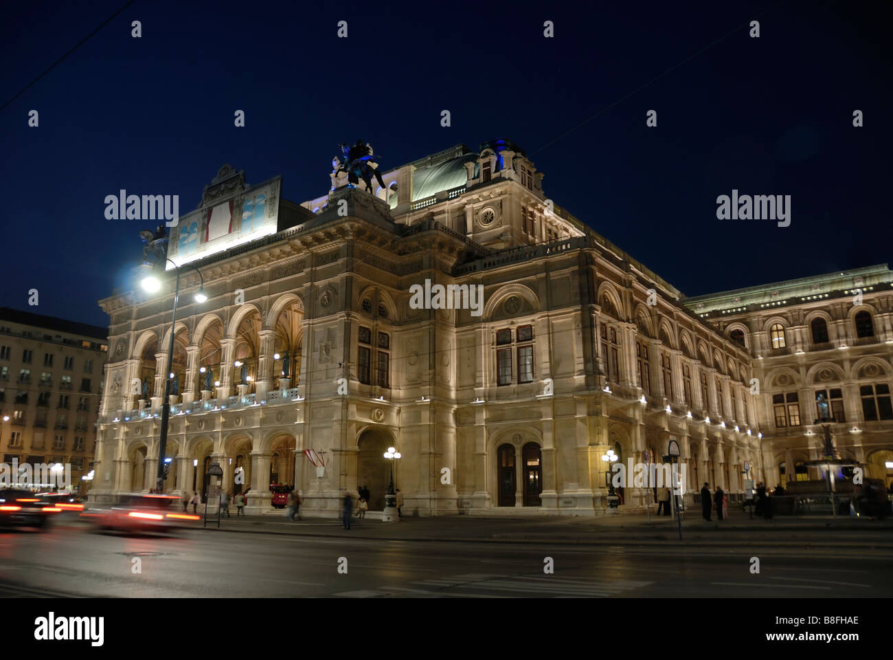 The vienna opera illuminated by night Stock Photo - Alamy