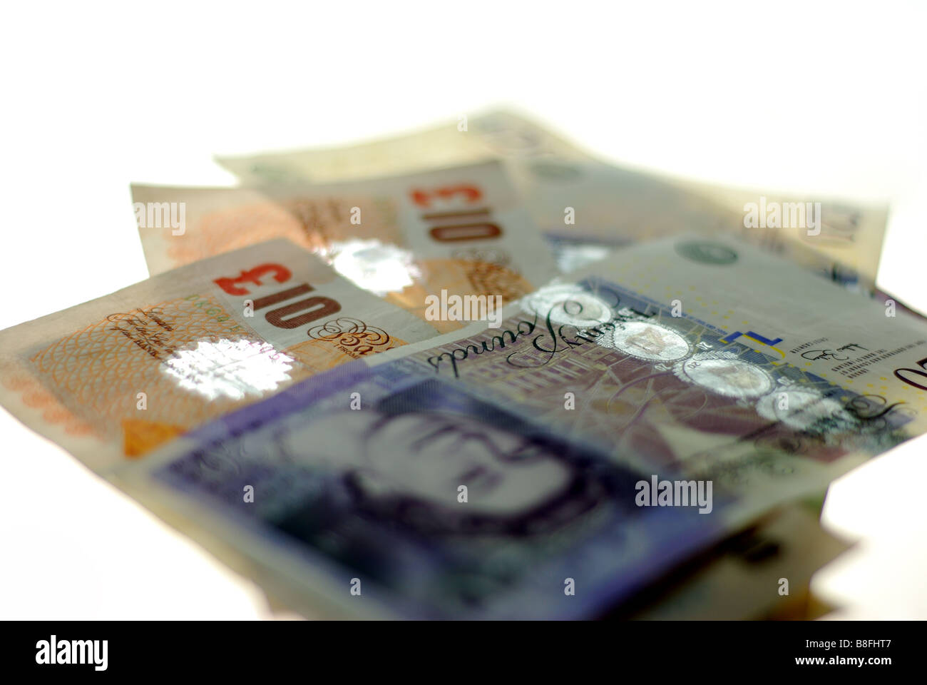 10 pound notes pile hi-res stock photography and images - Alamy
