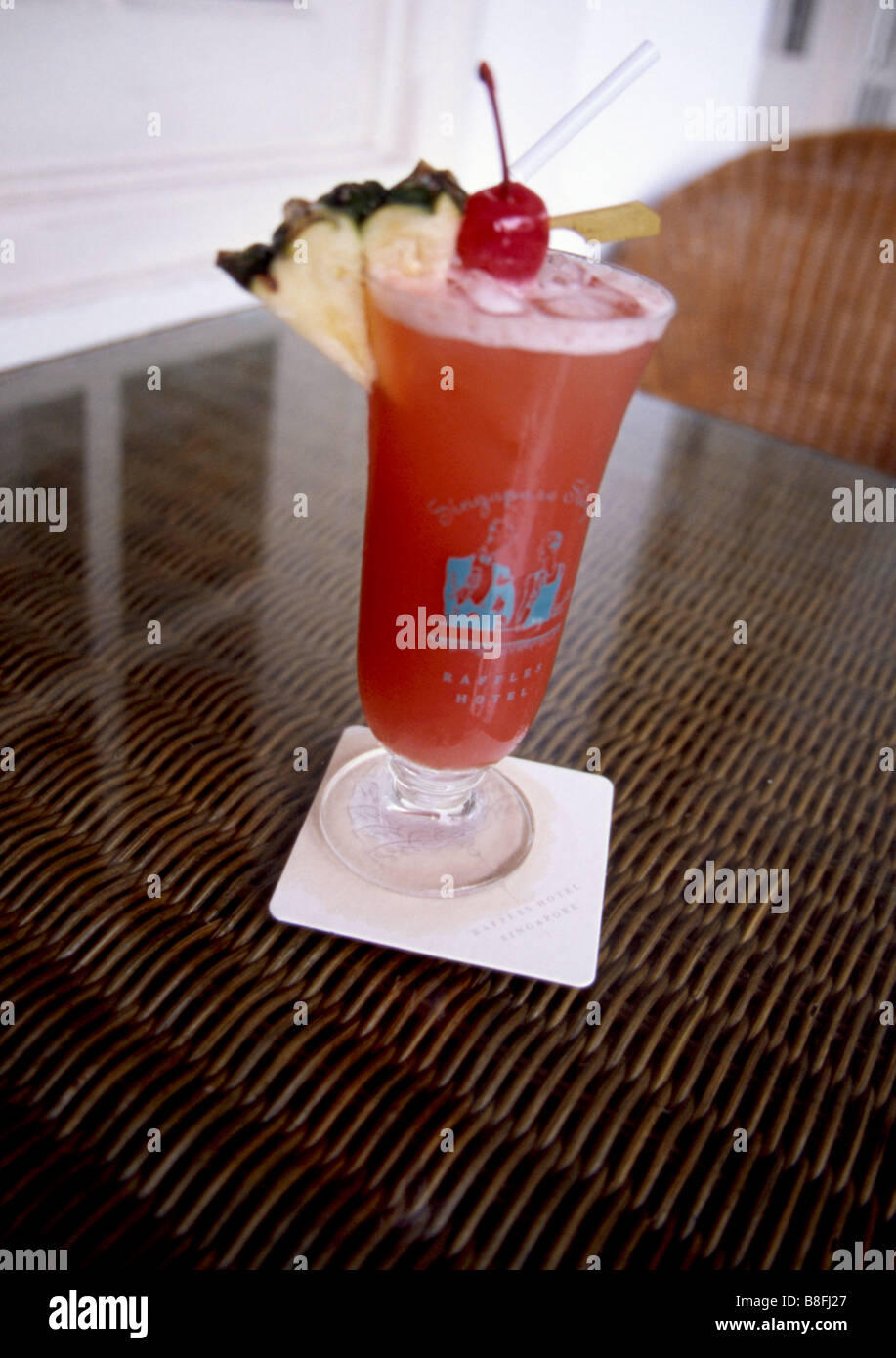 Singapore Sling cocktail at the Long Bar Raffles Hotel Singapore Stock ...