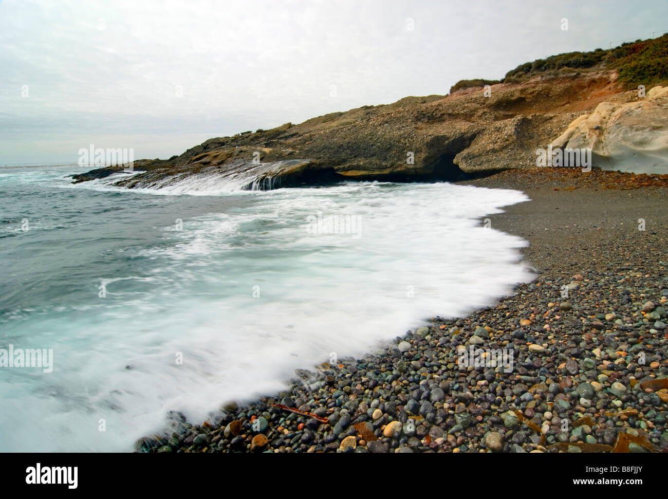 Wave crashing over pebble hi-res stock photography and images - Alamy