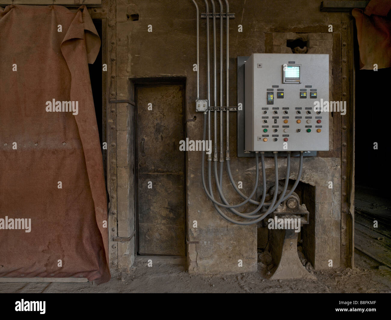 Old factory with new electrical control box Stock Photo - Alamy