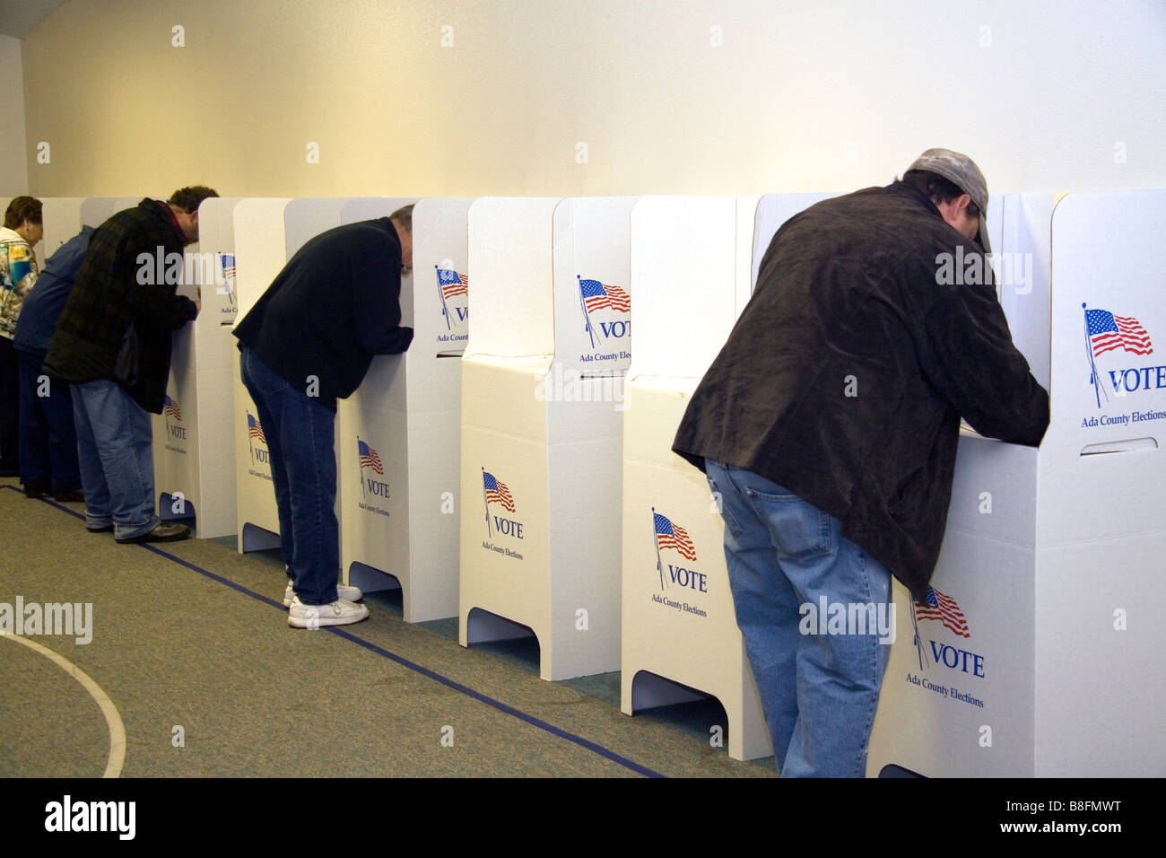Voting in cardboard voting booths at a polling station in Boise Idaho ...