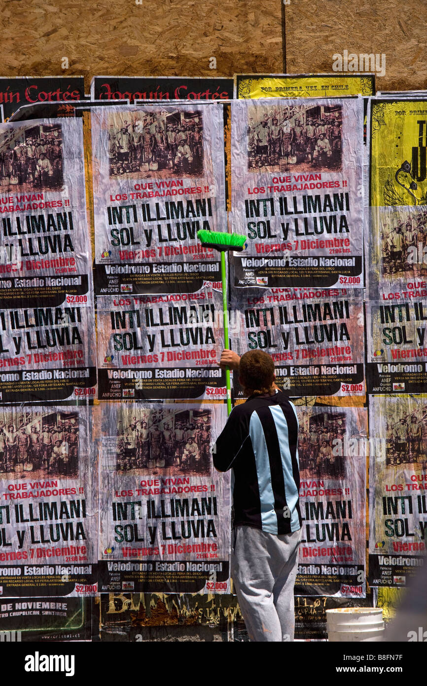 Putting up posters in Bellavista Santiago Chile Stock Photo - Alamy