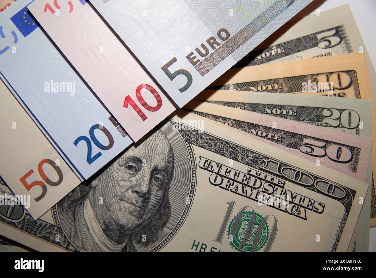 A stack of Euro and Dollar bank notes / currency / money / cash Stock ...