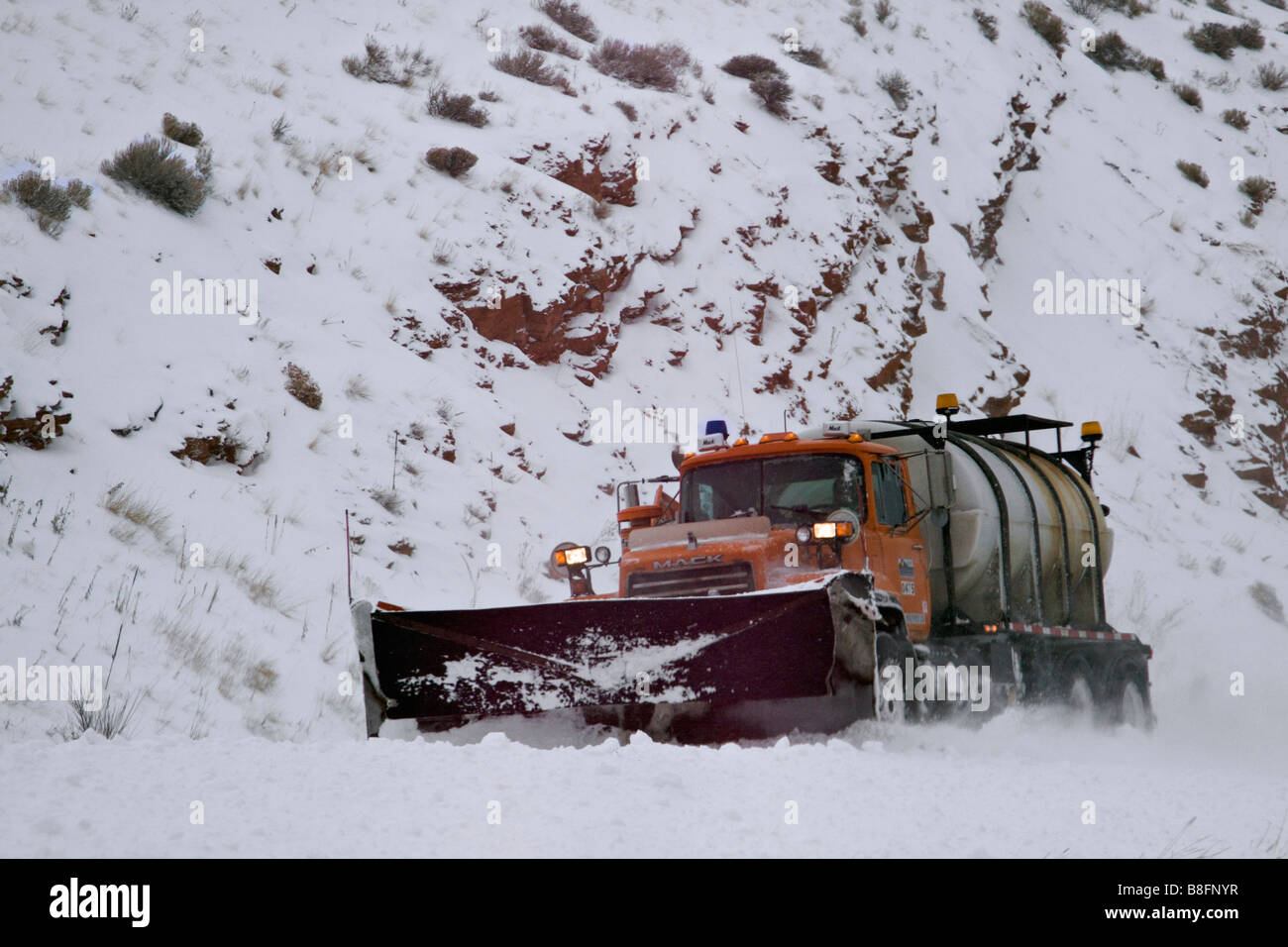 Snow plow on Interstate 70 in Colorado Stock Photo - Alamy