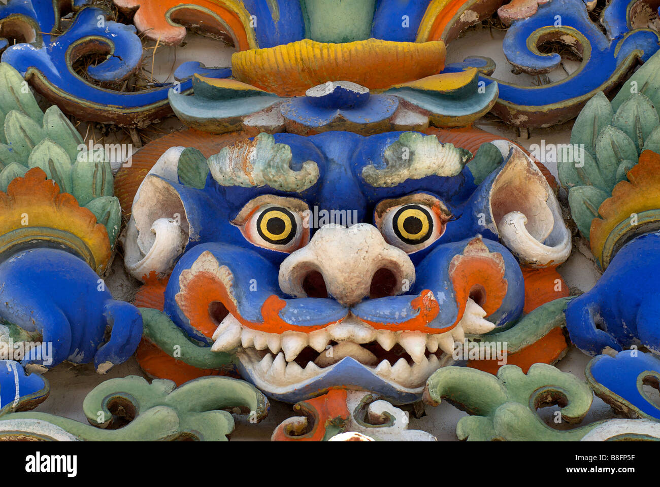 Plasterwork sculpture of a dragon guardian, Kumbum Pelkor Chöde ...