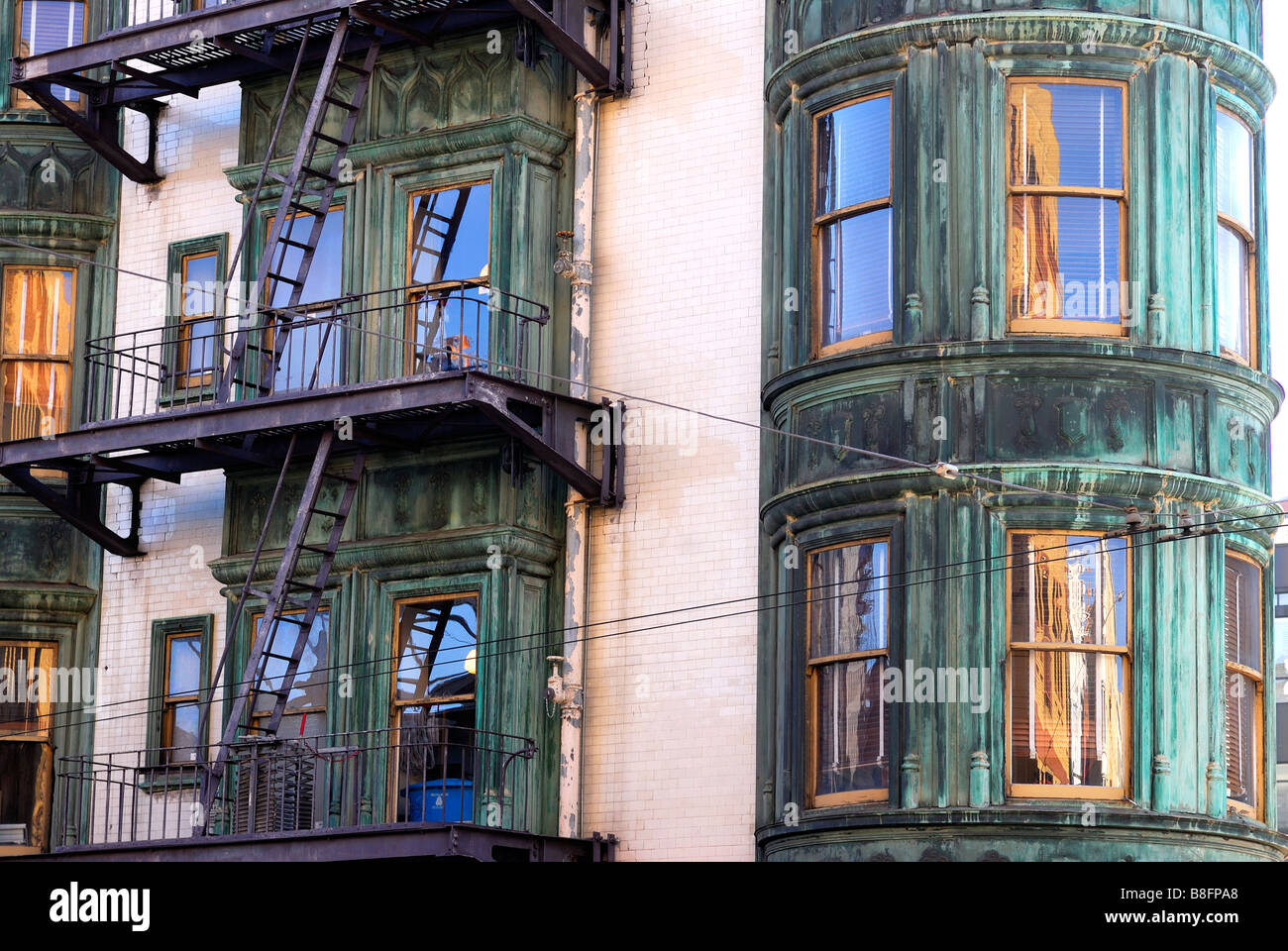 frontage of an old building in San Francisco green color and yellow ...