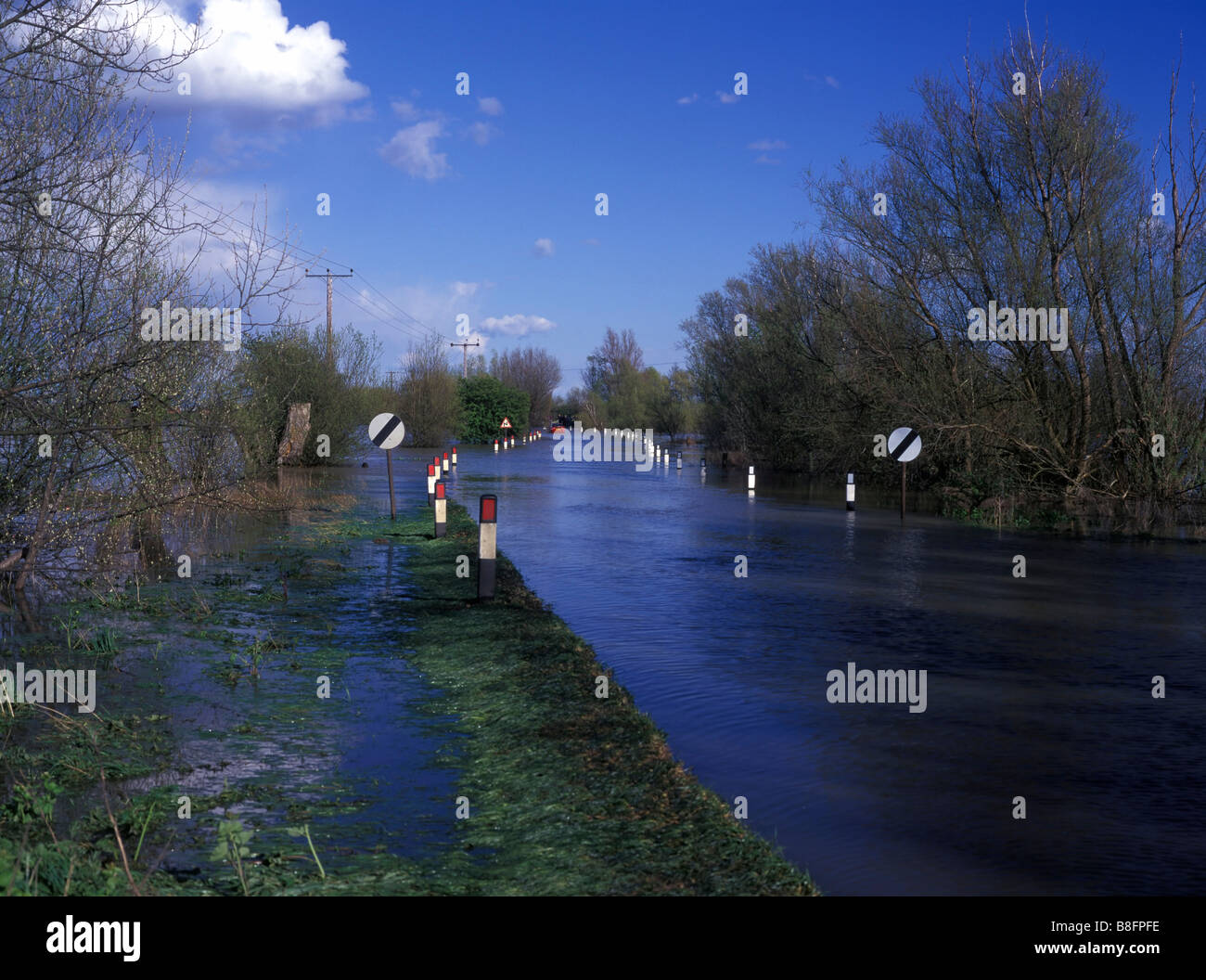 Flooded fen road, Cambridgeshire Stock Photo - Alamy