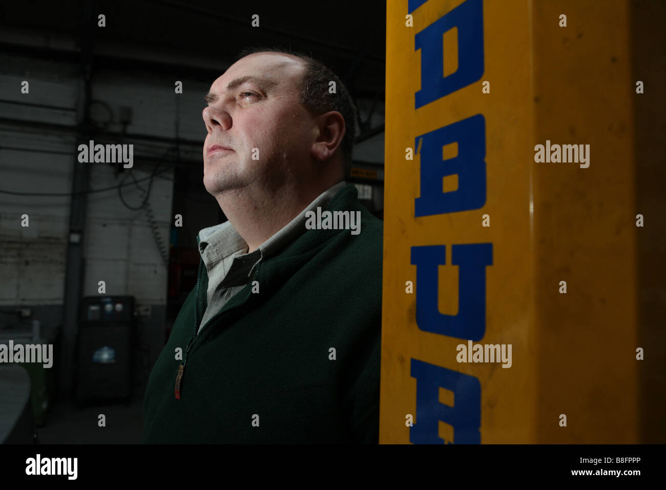 Mechanic working hard on car hi-res stock photography and images - Alamy