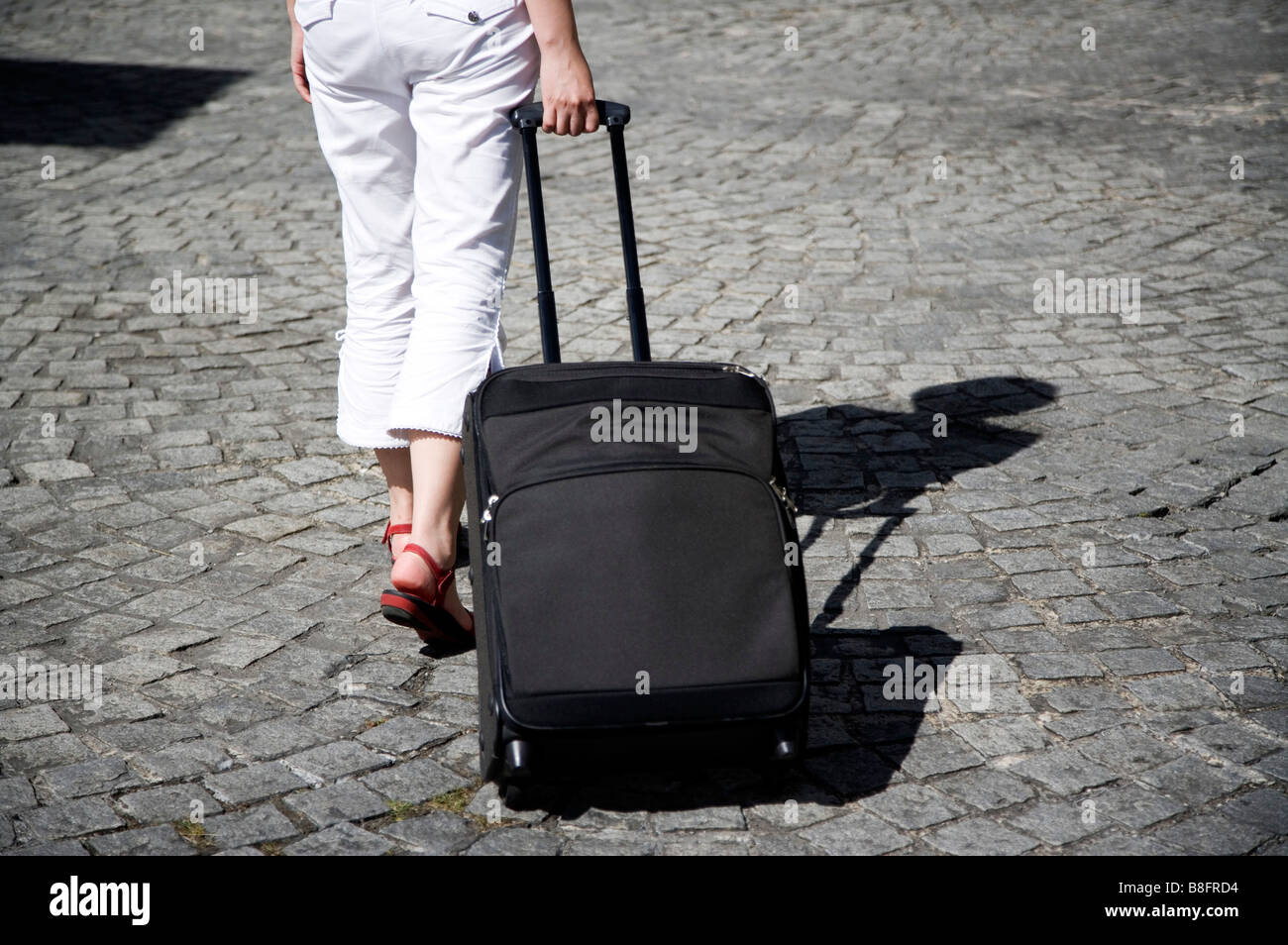 Pullingsuitcase hi-res stock photography and images - Alamy