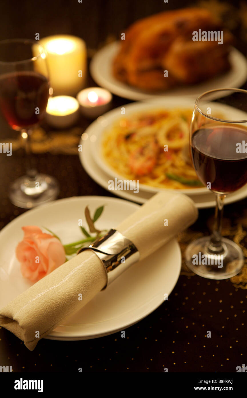 Place setting food and drink on the dining table Stock Photo - Alamy