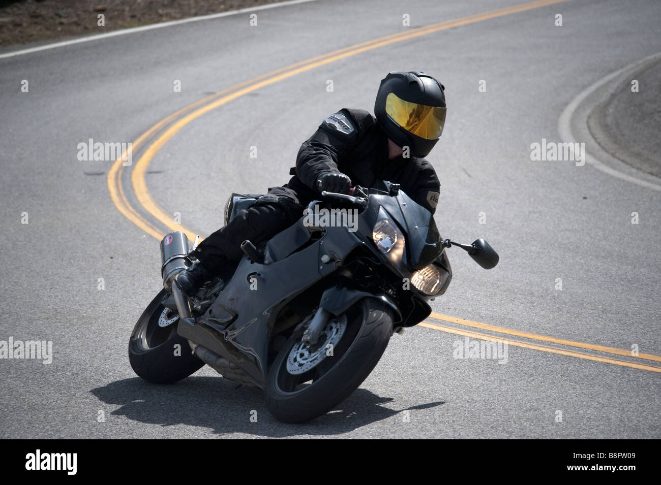 Motorcycle and Rider on Mulholland Highway in Southern California Stock ...