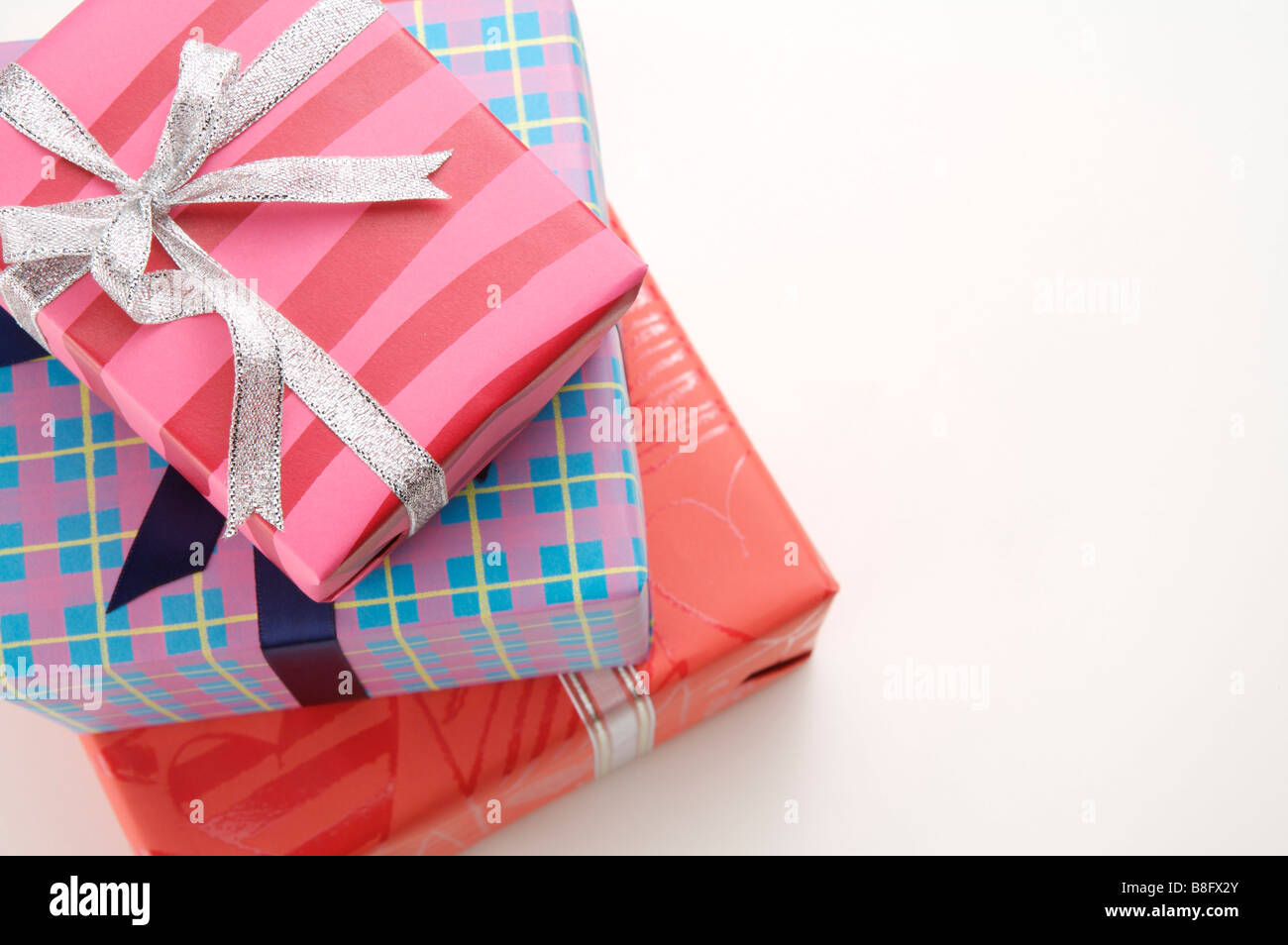 Close up of three wrapped presents Stock Photo - Alamy