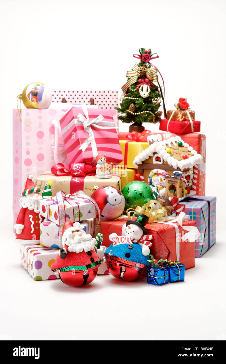 Stack of presents and Christmas decorations Stock Photo - Alamy