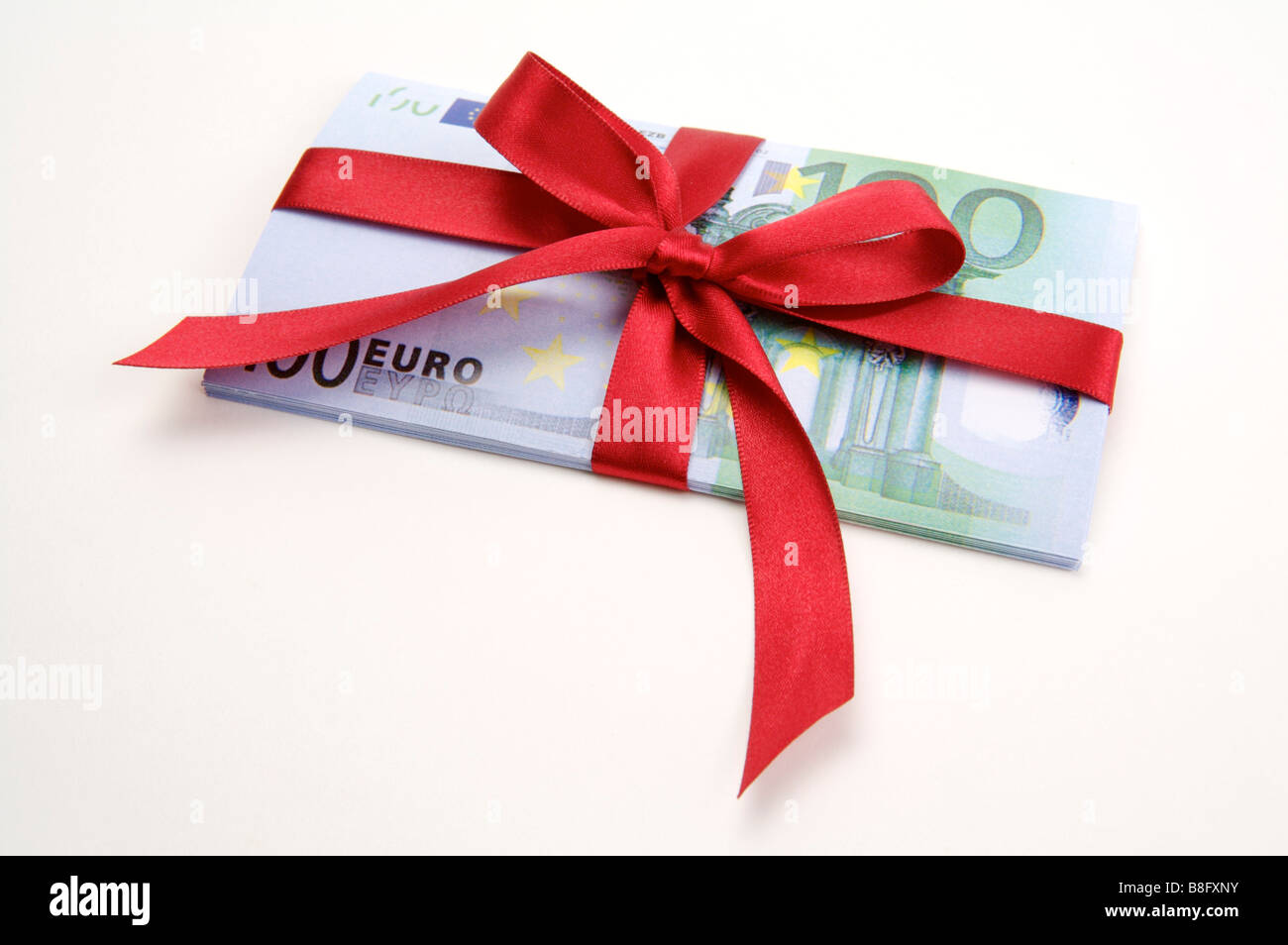 Close up of paper money with a tied ribbon Stock Photo - Alamy