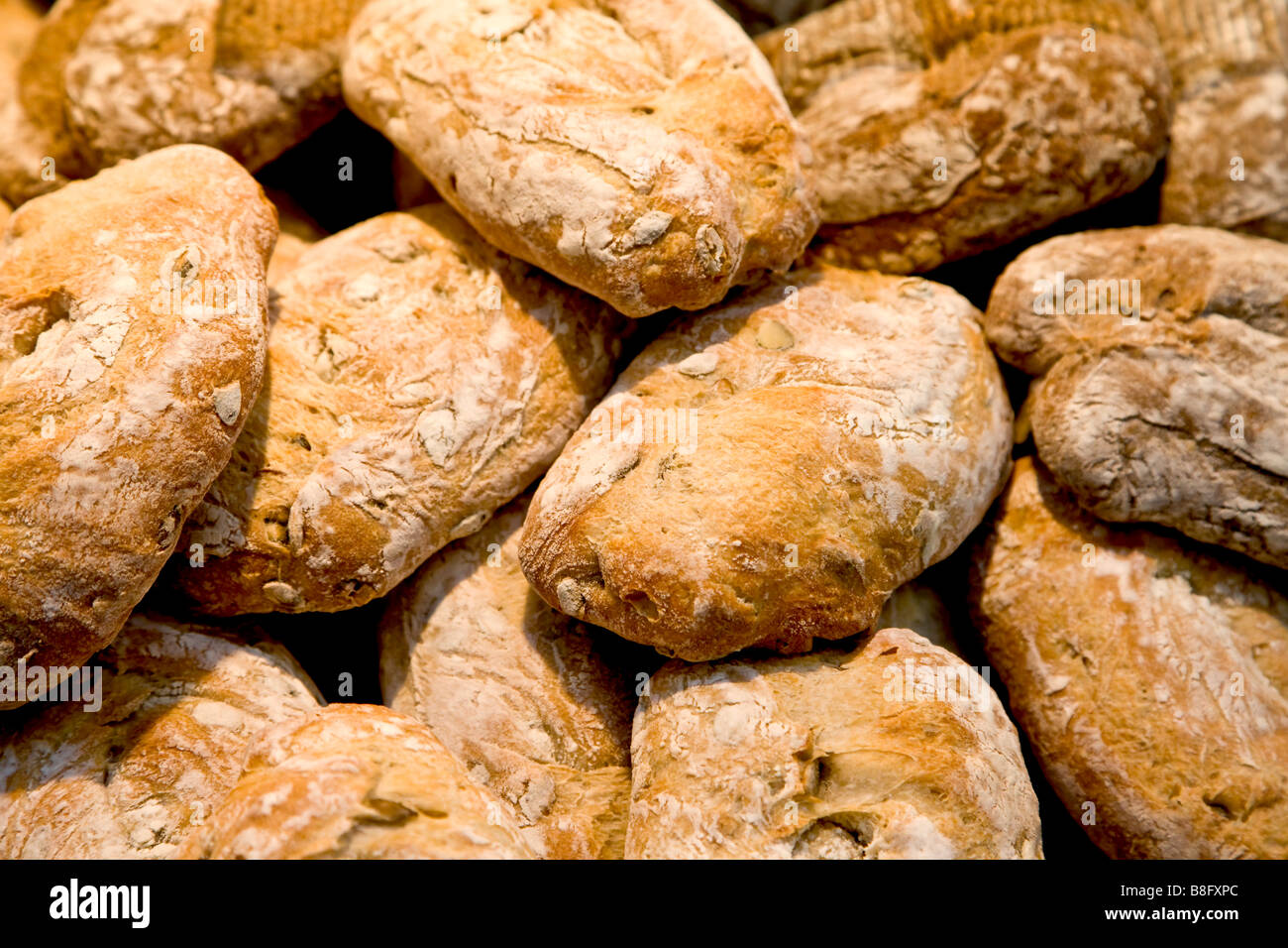Heap of bread loaves Stock Photo - Alamy