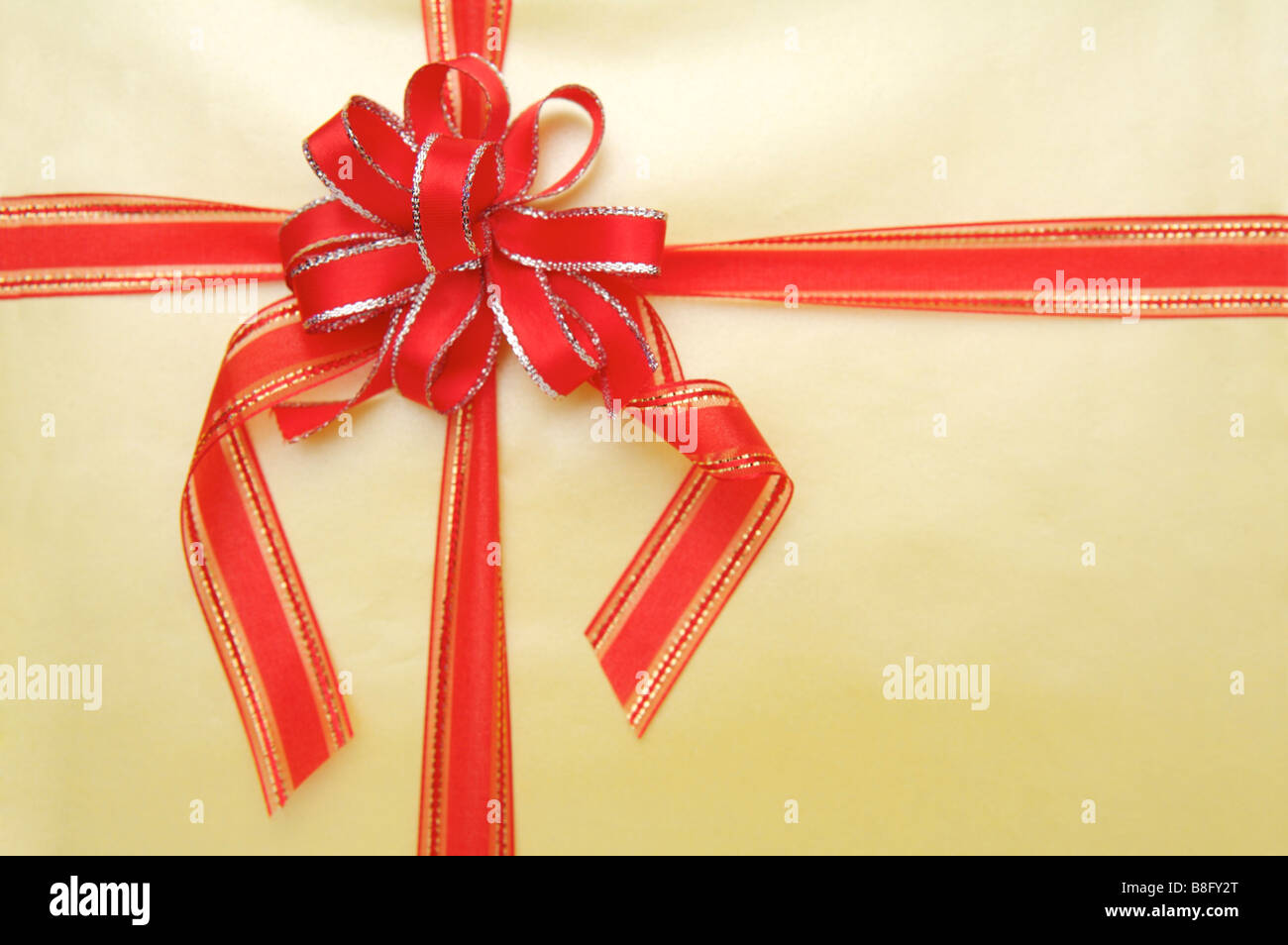 Close up of a red tied ribbon Stock Photo - Alamy