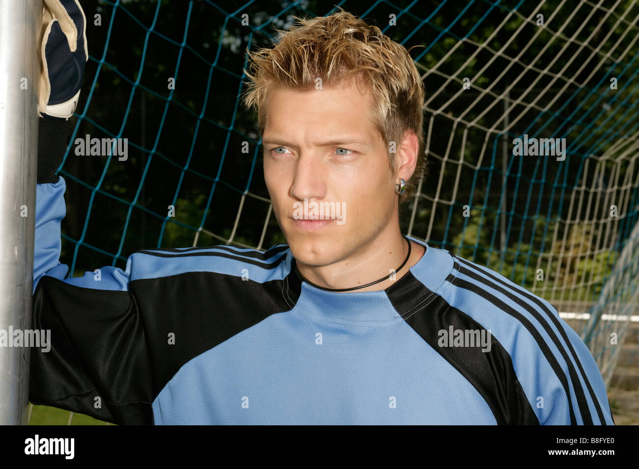 Wearing a football shirt hi-res stock photography and images - Alamy