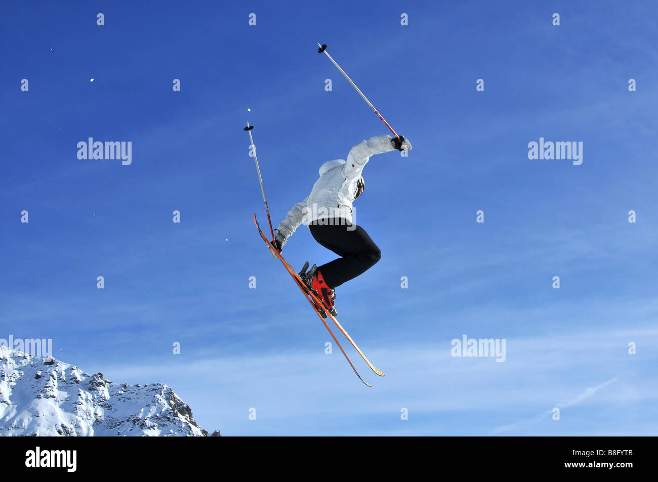 a skier performing a dramatic jump Stock Photo - Alamy