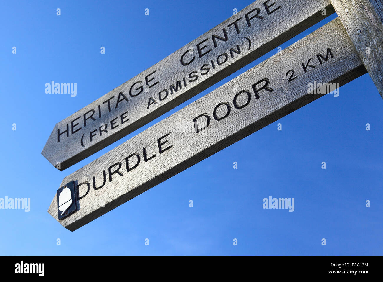 Durdle Door sign against the blue sky Dorset England Stock Photo - Alamy