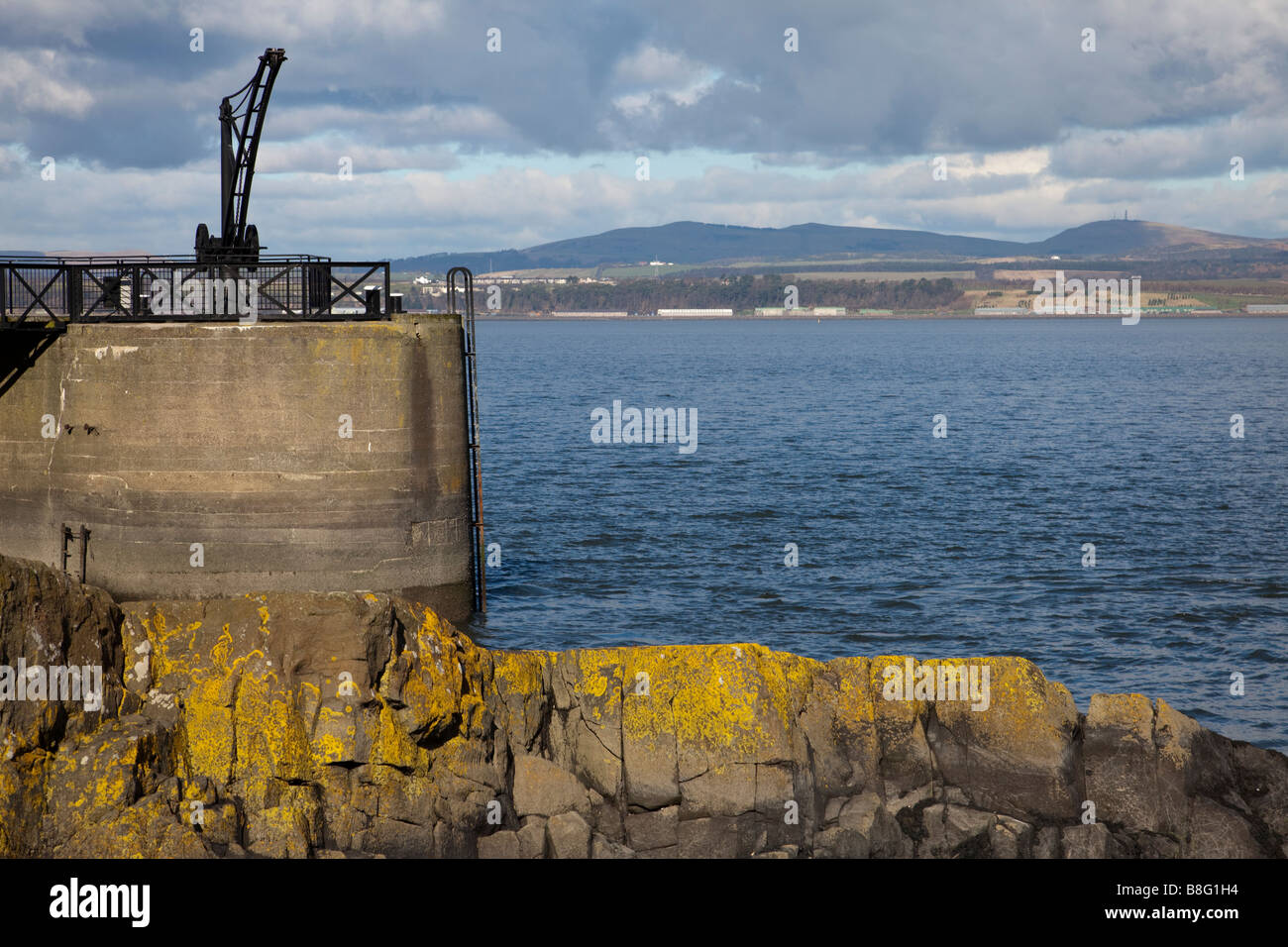 Crane on jetty Stock Photo - Alamy