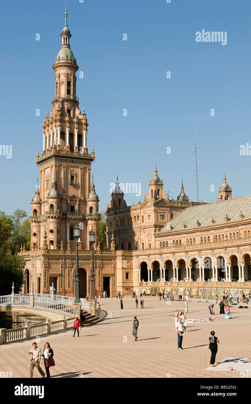SEVILLE, SPAIN: People walk as the sun shines on the city's Plaza de ...