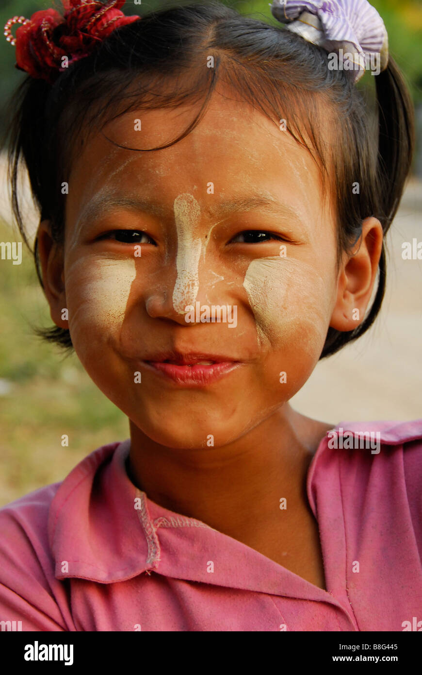Happy Burmese kid with tanaka on face,Thai Burmese border,Tak,Northern ...