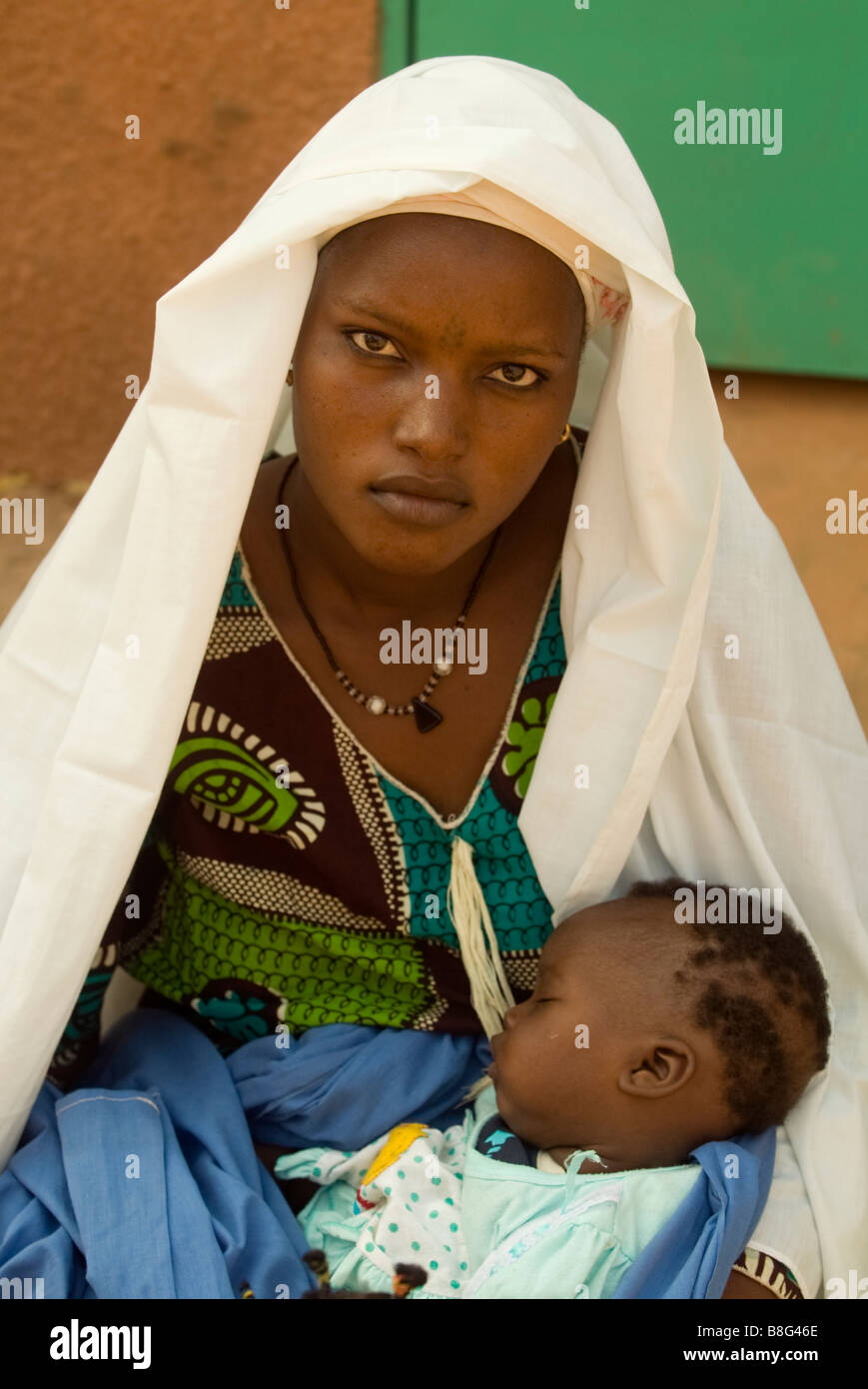 Muslim woman with her baby Ouagadougou Burkina Faso Stock Photo - Alamy