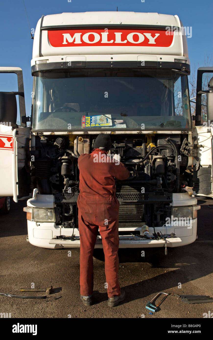 Mechanic servicing the engine of a lorry, Port of Felixstowe, Suffolk ...