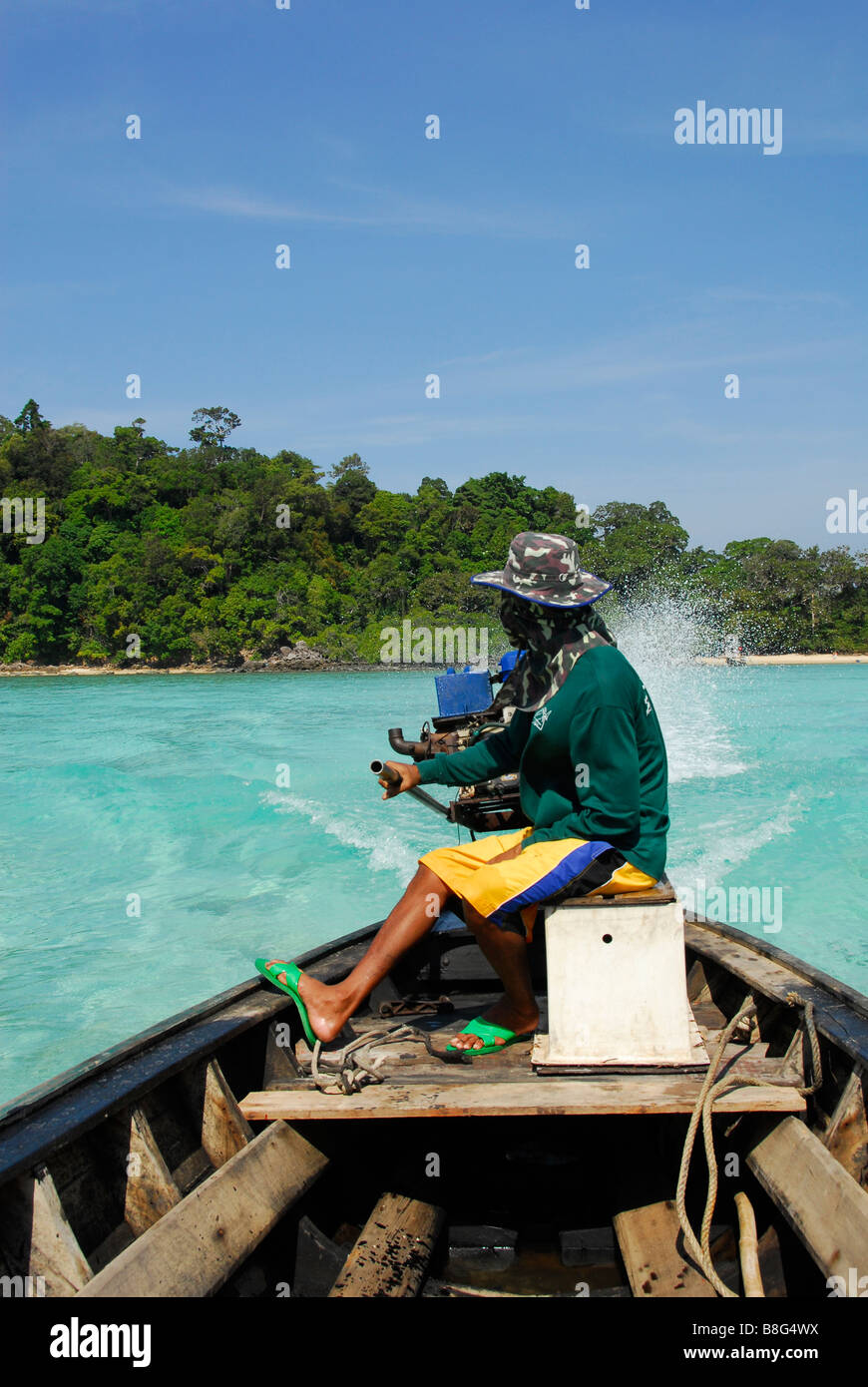 Moken man driving longtail boat to visit his village,Koh surin,PhangNga ...