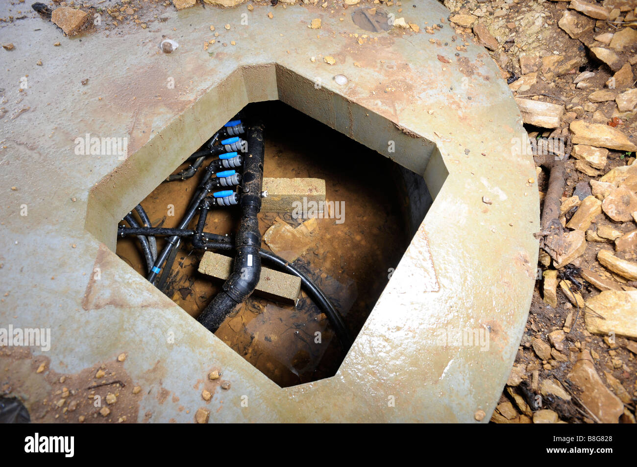 ACCESS PIT TO THE MANIFOLD SECTION OF A GROUND SOURCE HEAT SYSTEM AT AN ...