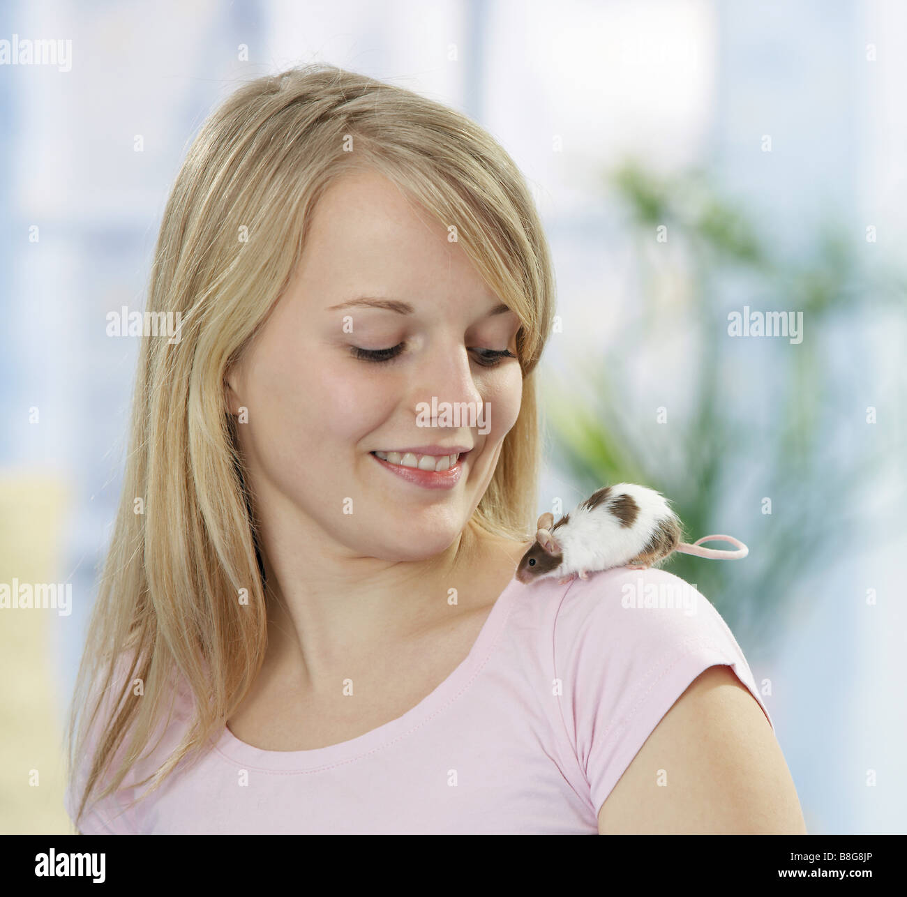 girl with fancy mouse Stock Photo - Alamy