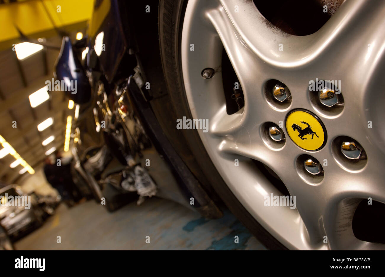 A DAMAGED FERRARI AT CLEAVE MOTOR SALVAGE IN GLOUCESTER UK Stock Photo ...