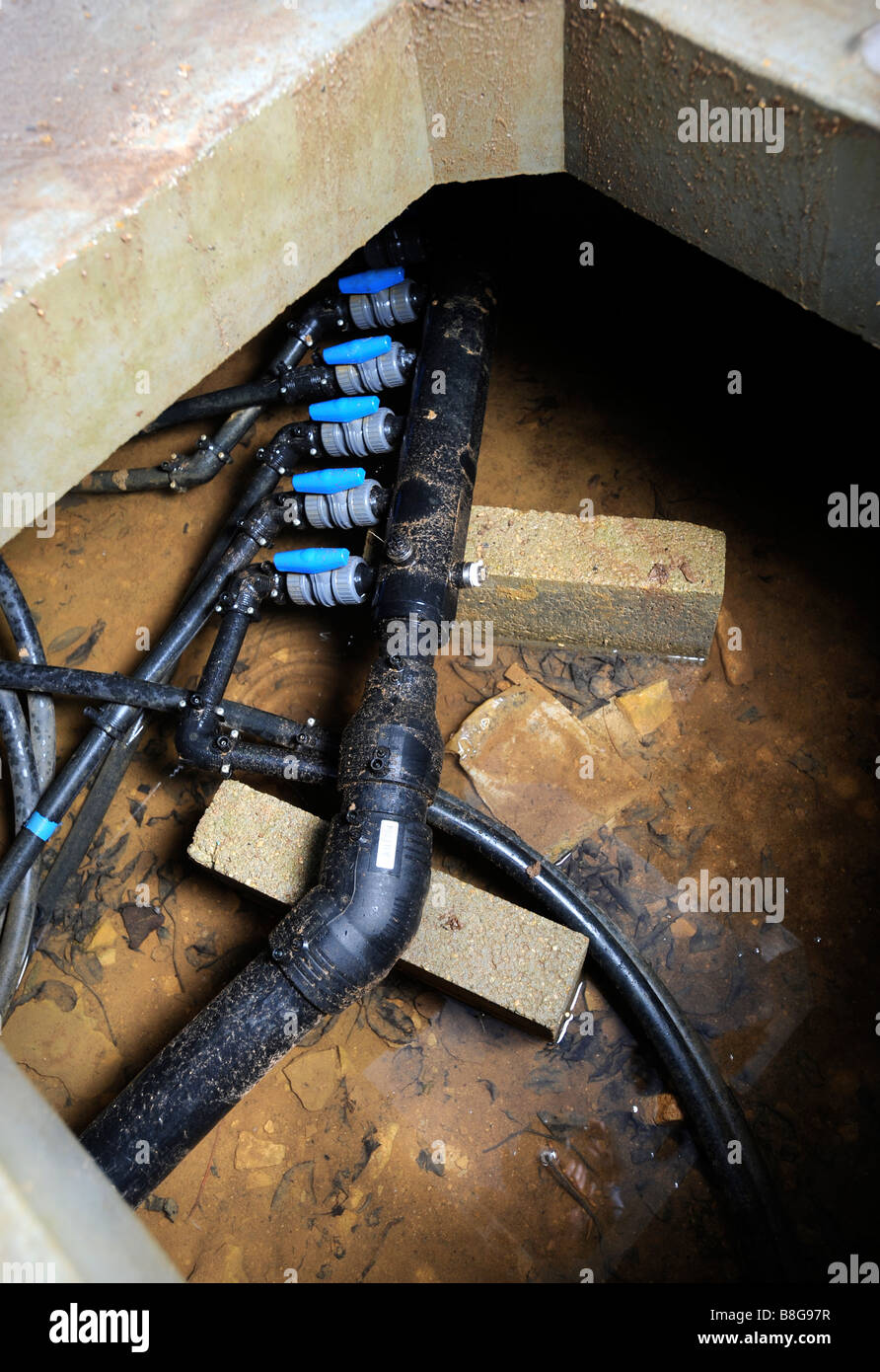 ACCESS PIT TO THE MANIFOLD SECTION OF A GROUND SOURCE HEAT SYSTEM AT AN ...
