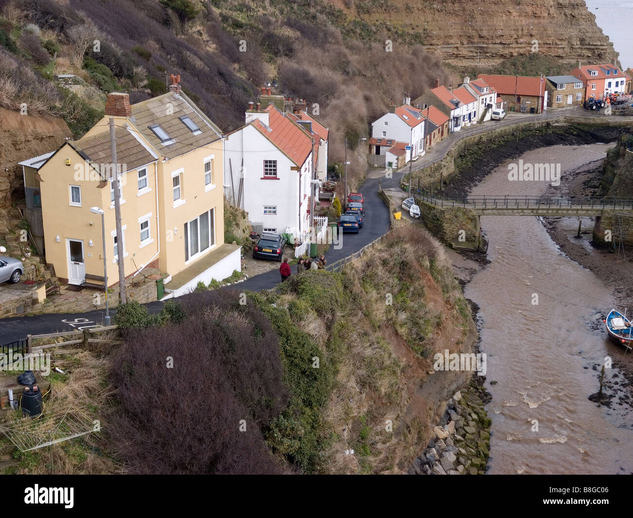 The hamlet of Cowbar across Roxby Beck in Staithes North Yorkshire ...