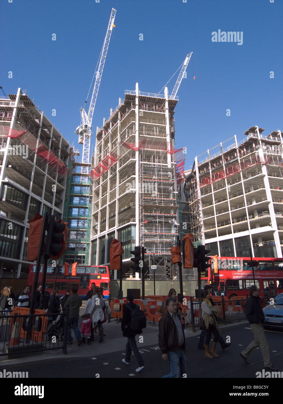 A new commercial and residential building under construction on the ...