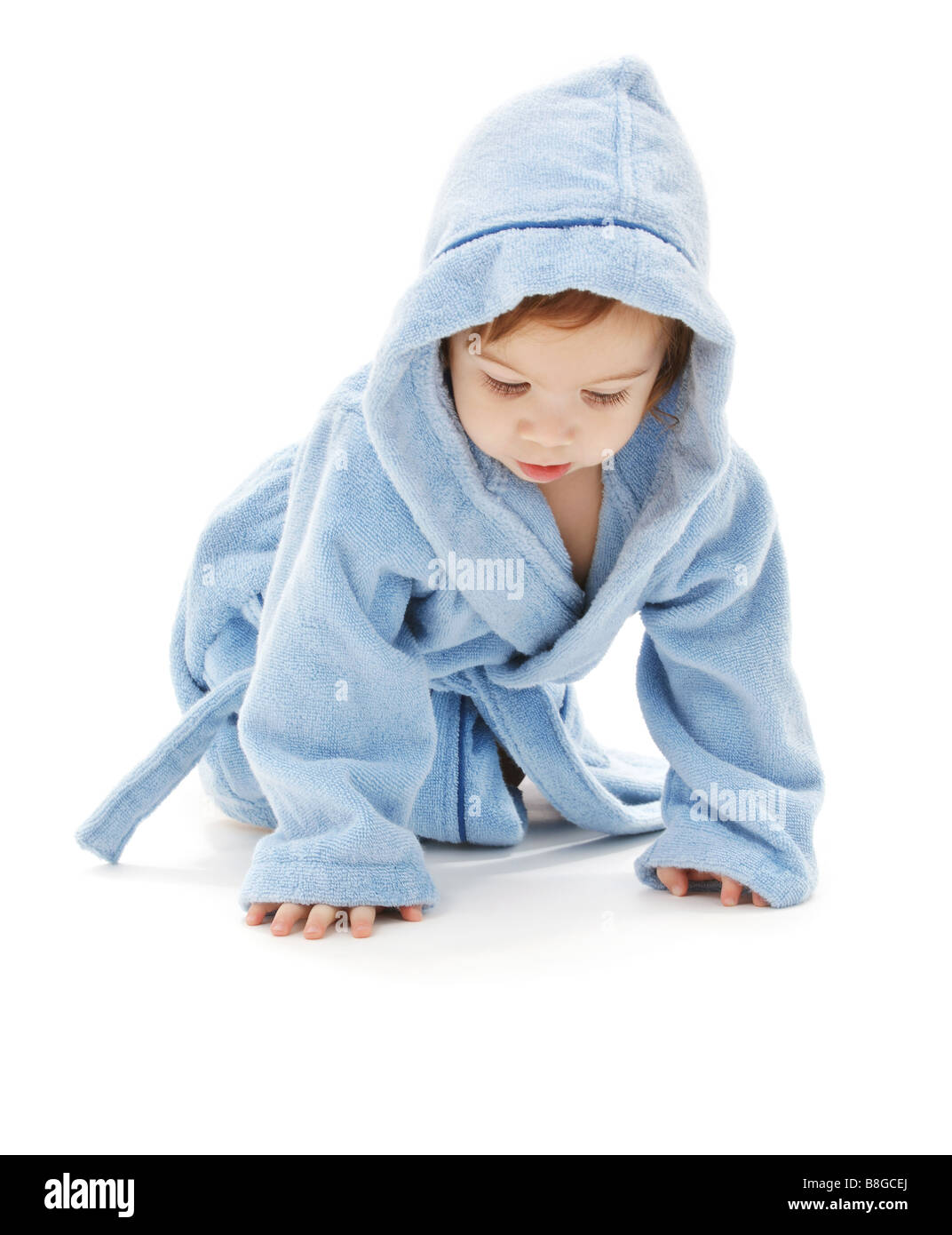 baby boy in blue robe over white Stock Photo - Alamy