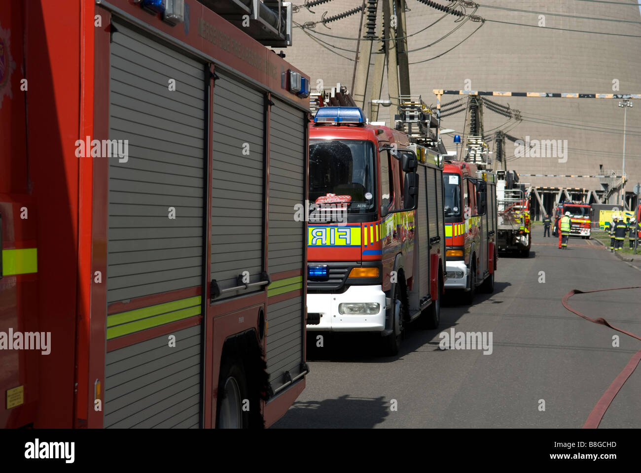 Fire engines lined up at electricity power station Stock Photo - Alamy
