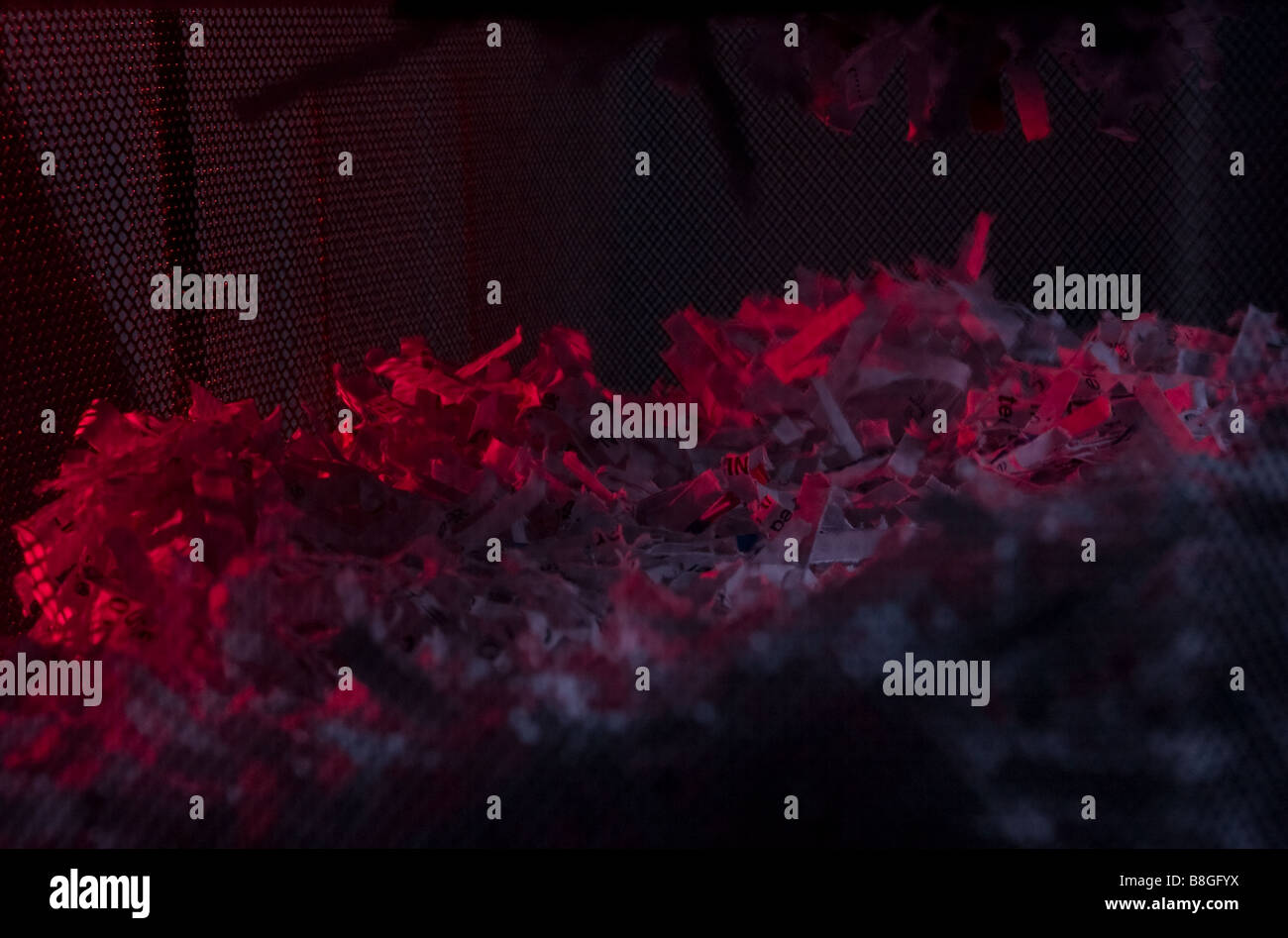 atmospheric moody image lit with red light of a personal document ...