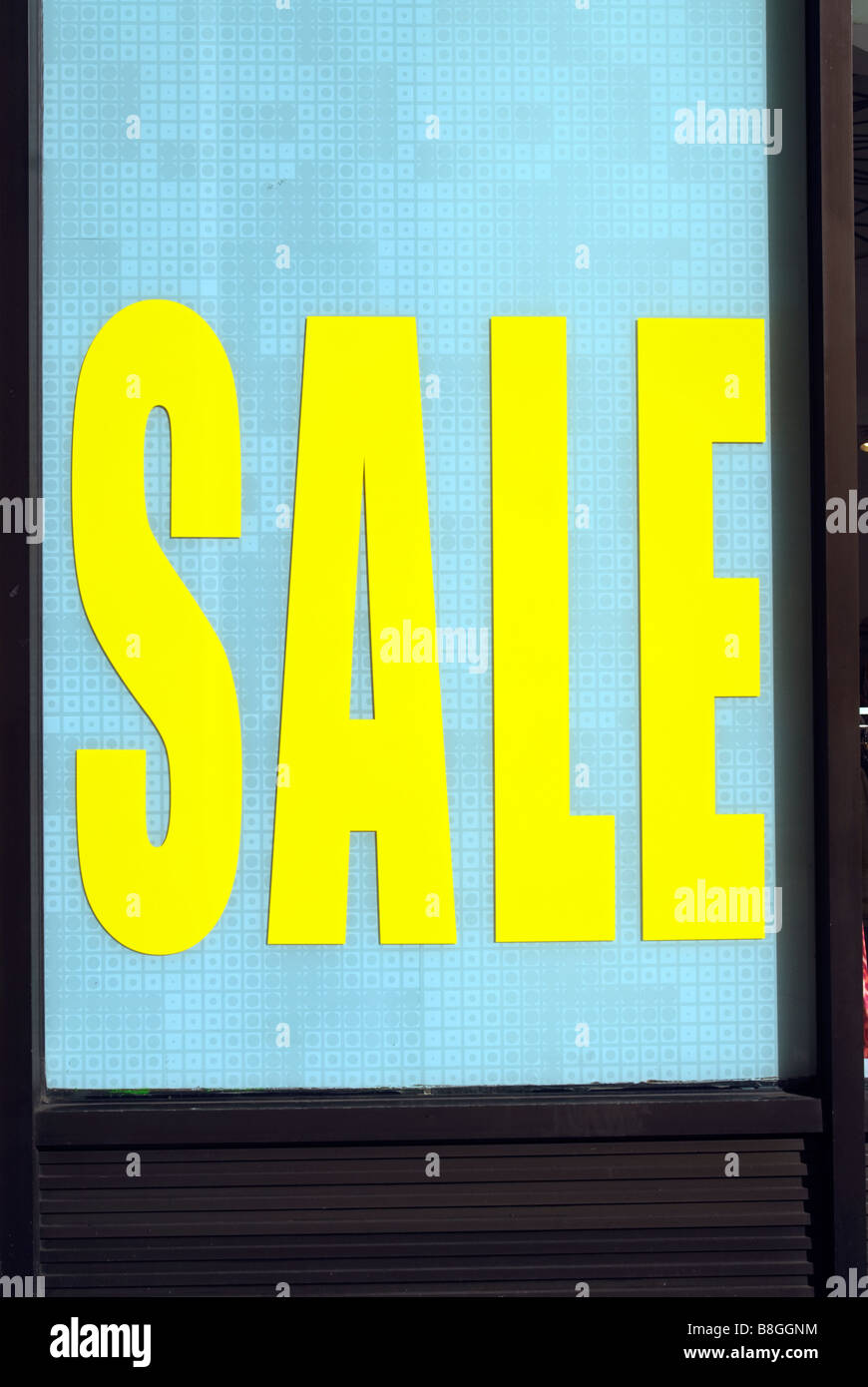 A sale sign is seen in the a store window in New York on Sunday ...