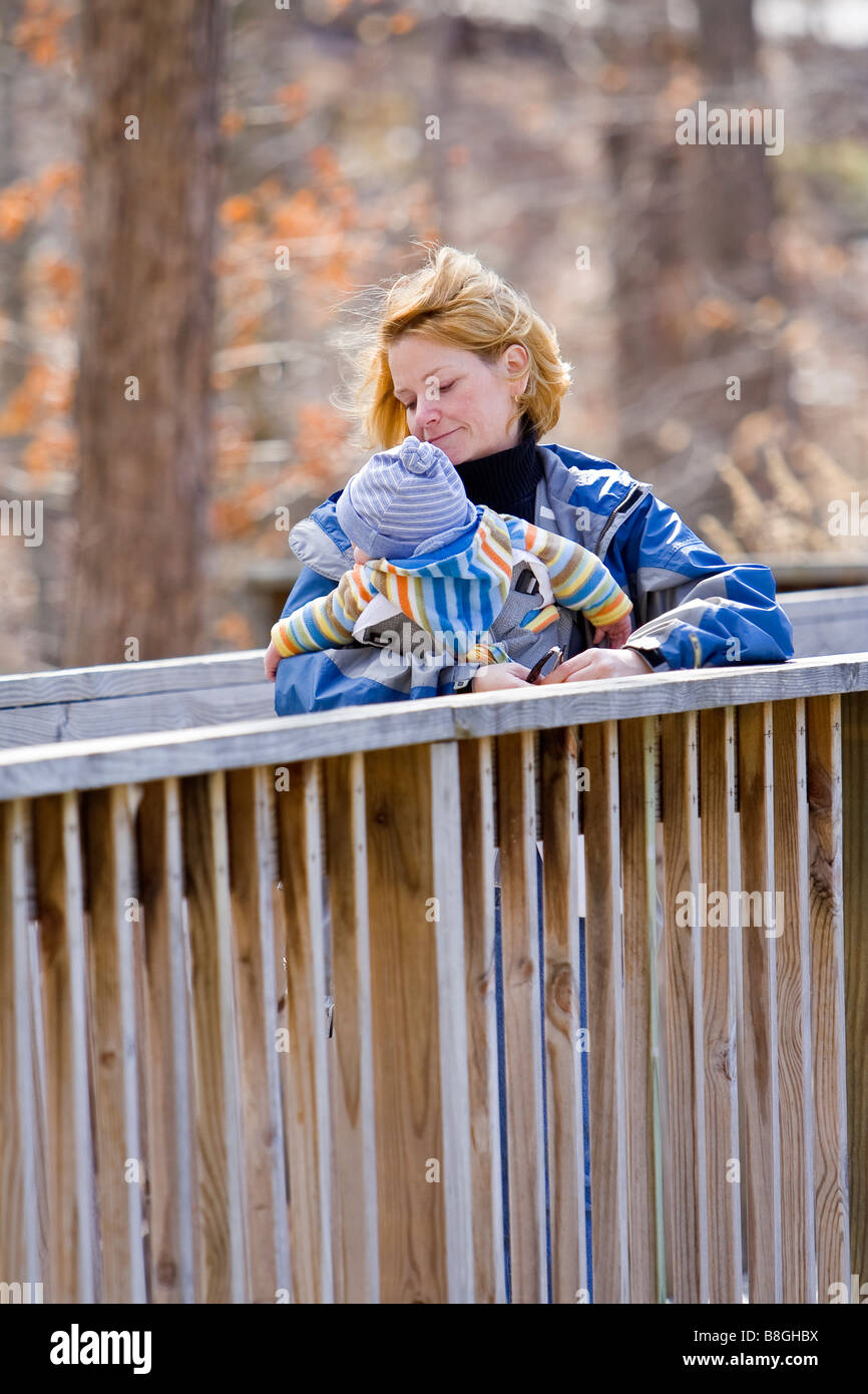 Thoughtful mother carrying baby hi-res stock photography and images - Alamy