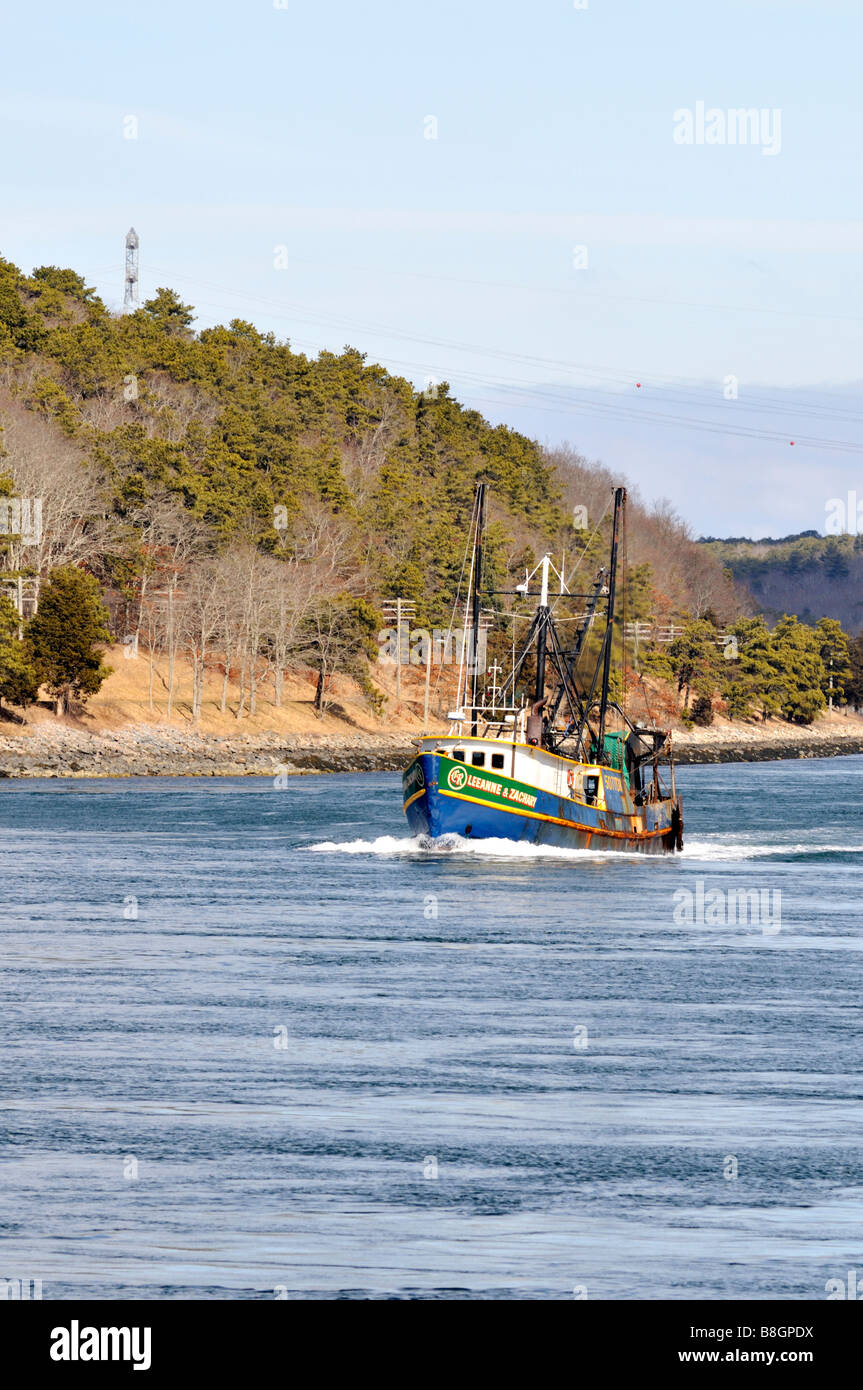 Gillnet fishing boat the Leeanne and Zachary cruising past coastline in ...
