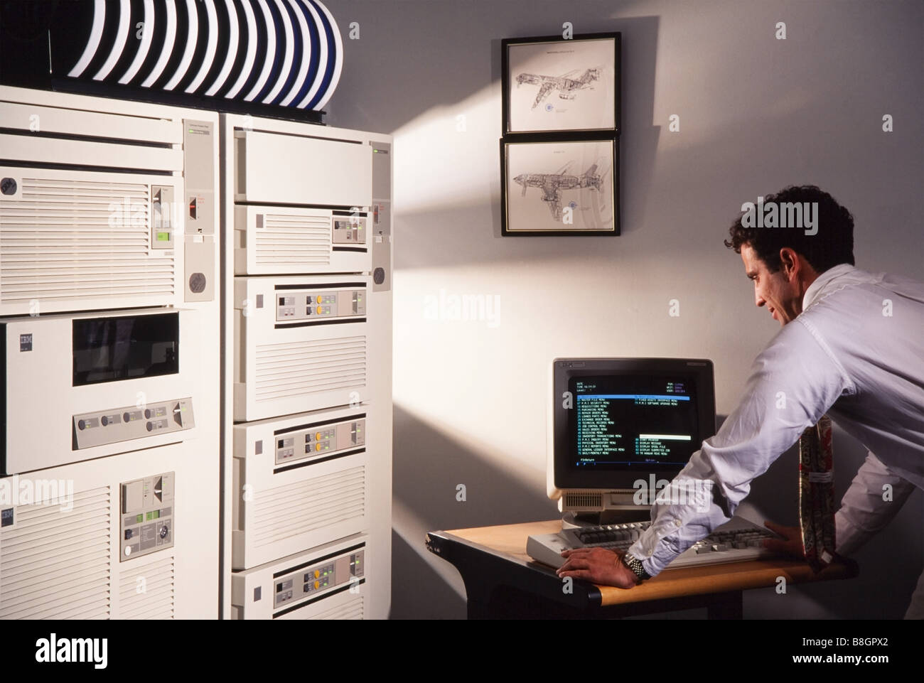 Executives at work in office setting with computer Stock Photo - Alamy