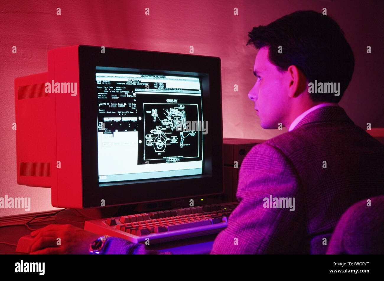 Executives at work in office setting with computer Stock Photo - Alamy