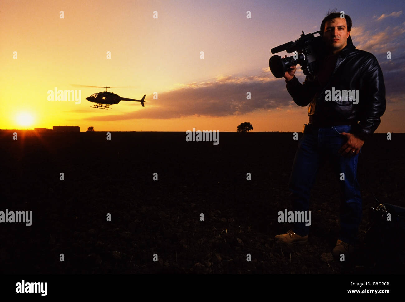 People working,TV cameraman with traffic helicopter Stock Photo - Alamy