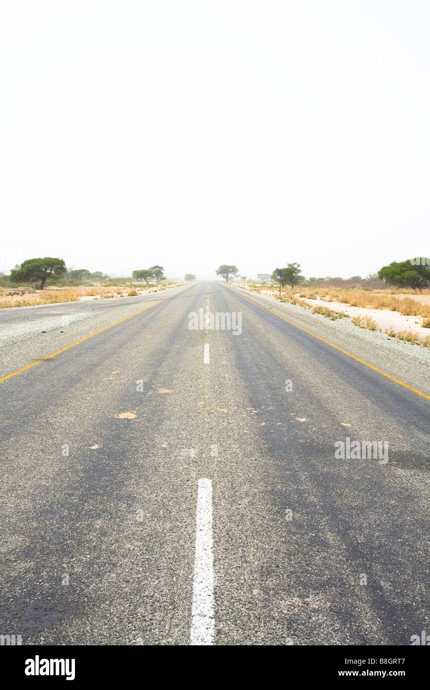 Long road leading forward Stock Photo - Alamy