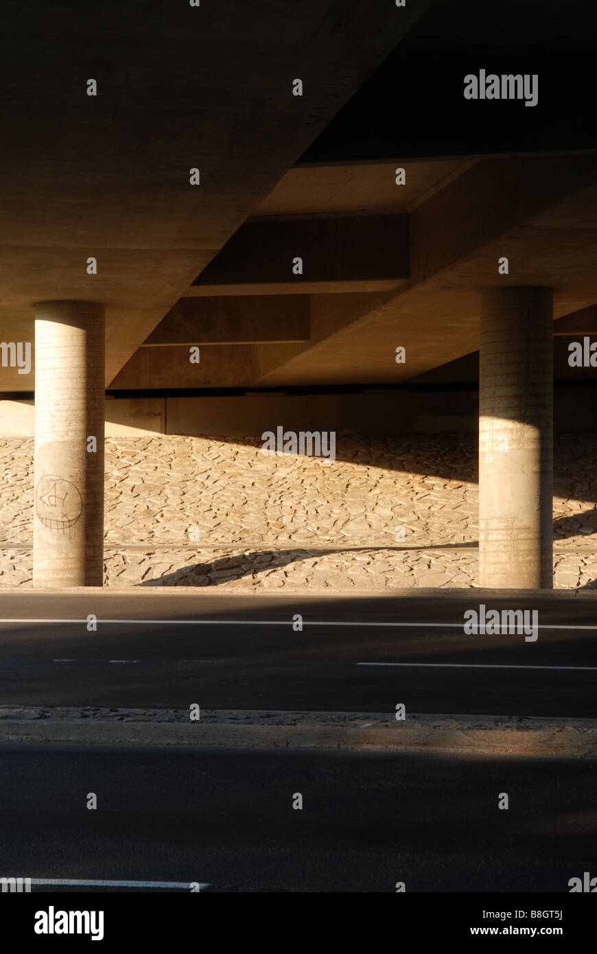 Concrete highway underpass with street Stock Photo - Alamy